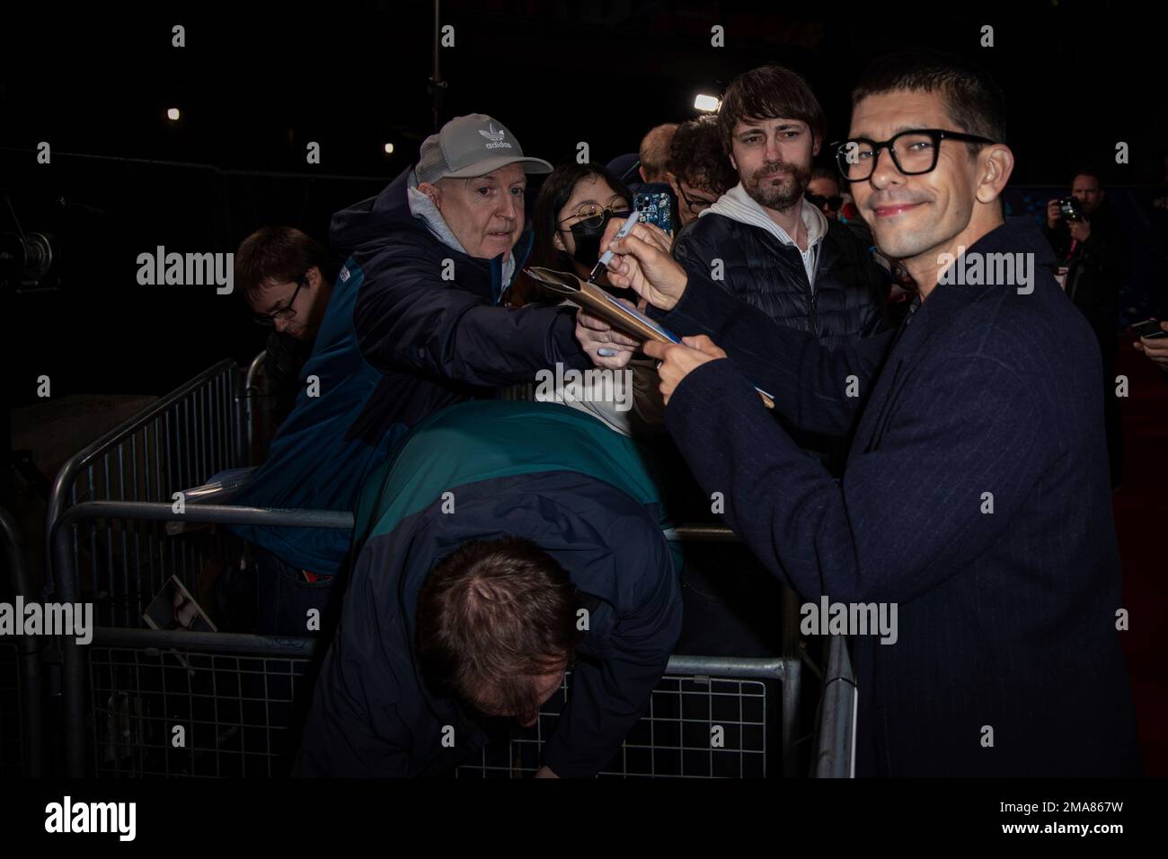 Ben Whishaw interacts with fans upon arrival for the premiere of the ...