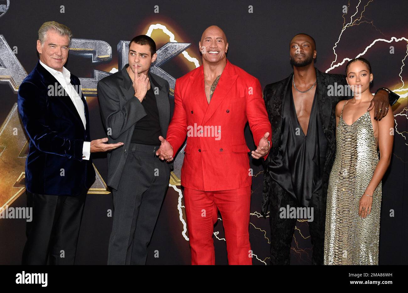 Pierce Brosnan, left, Noah Centineo, Dwayne Johnson, Aldis Hodge and ...