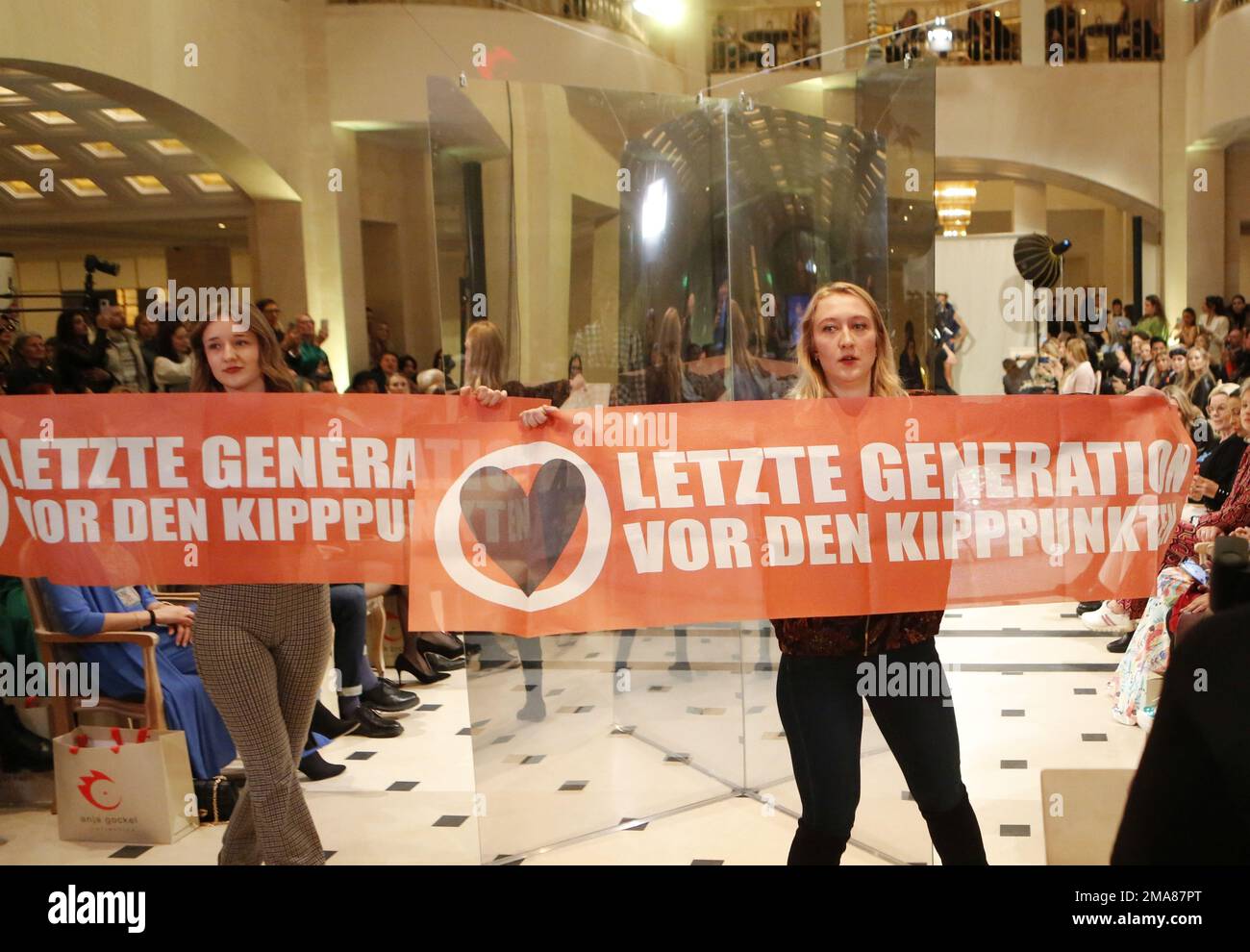 Germany, Berlin, 01/18/2023. Two climate activists protest during Anja ...