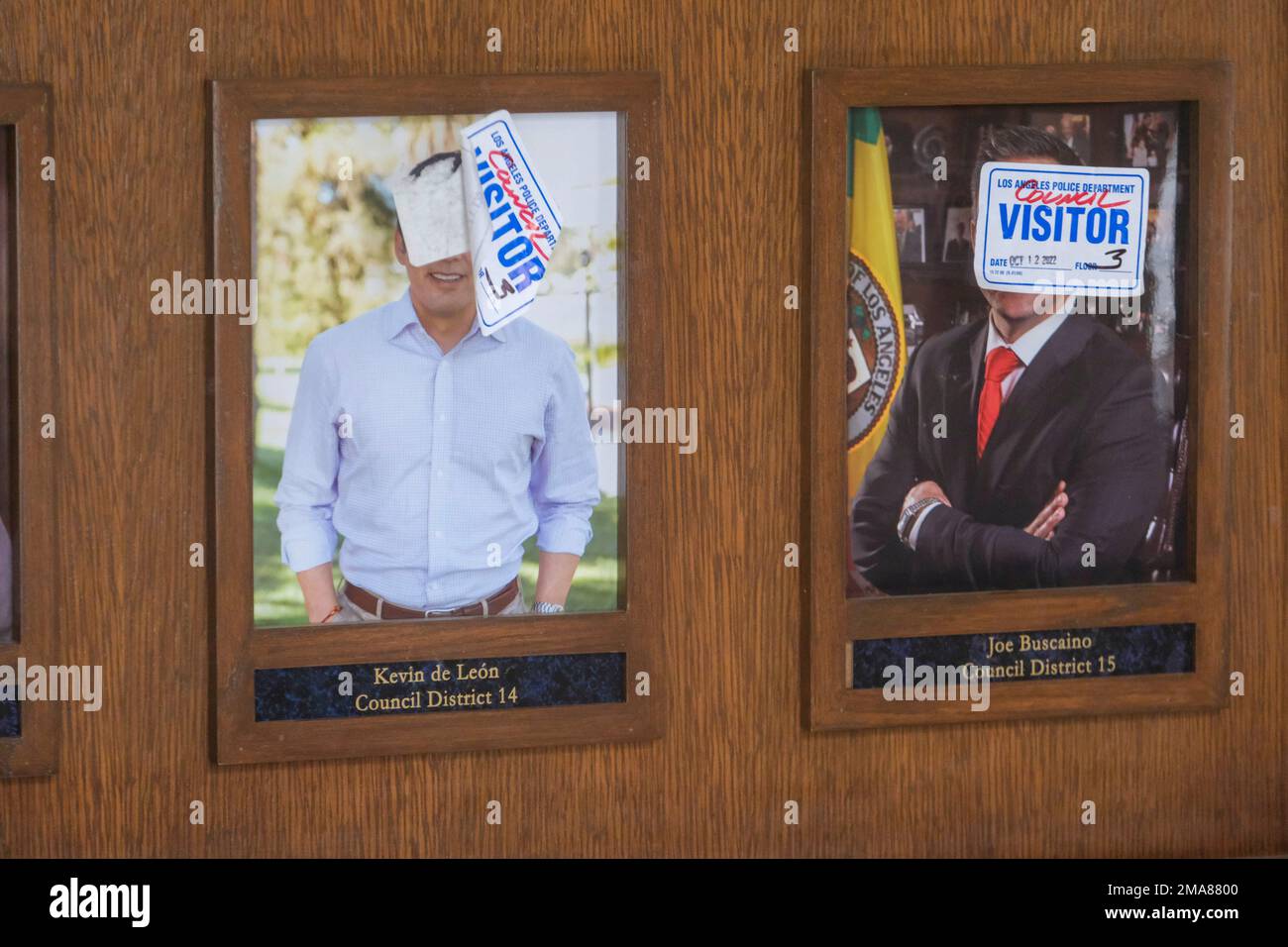 Stickers are placed at the pictures of Los Angeles Council members ...
