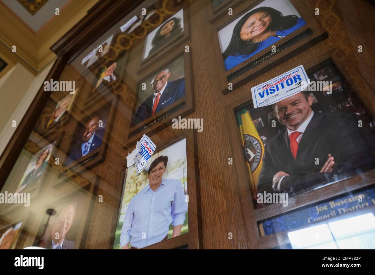 Stickers are placed at the pictures of Los Angeles Council members ...