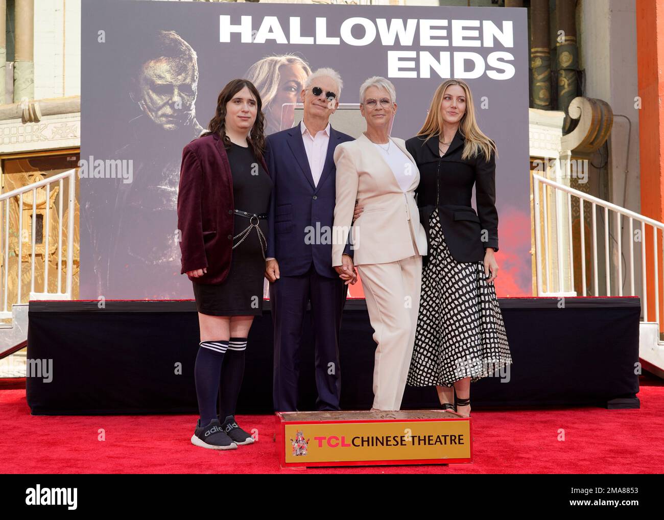 Actor Jamie Lee Curtis, second from right, poses with her husband ...