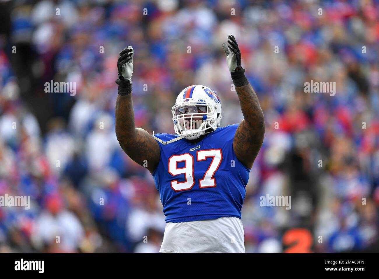 Buffalo Bills defensive tackle Jordan Phillips (97) urges the crowd ...