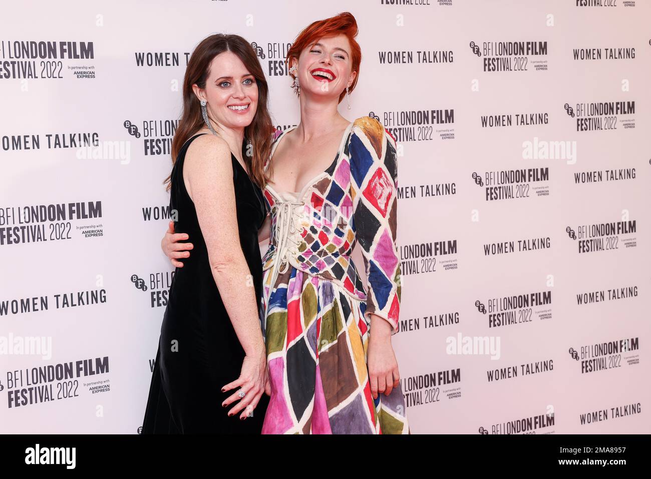Claire Foy, left, and Jessie Buckley pose for photographers upon ...