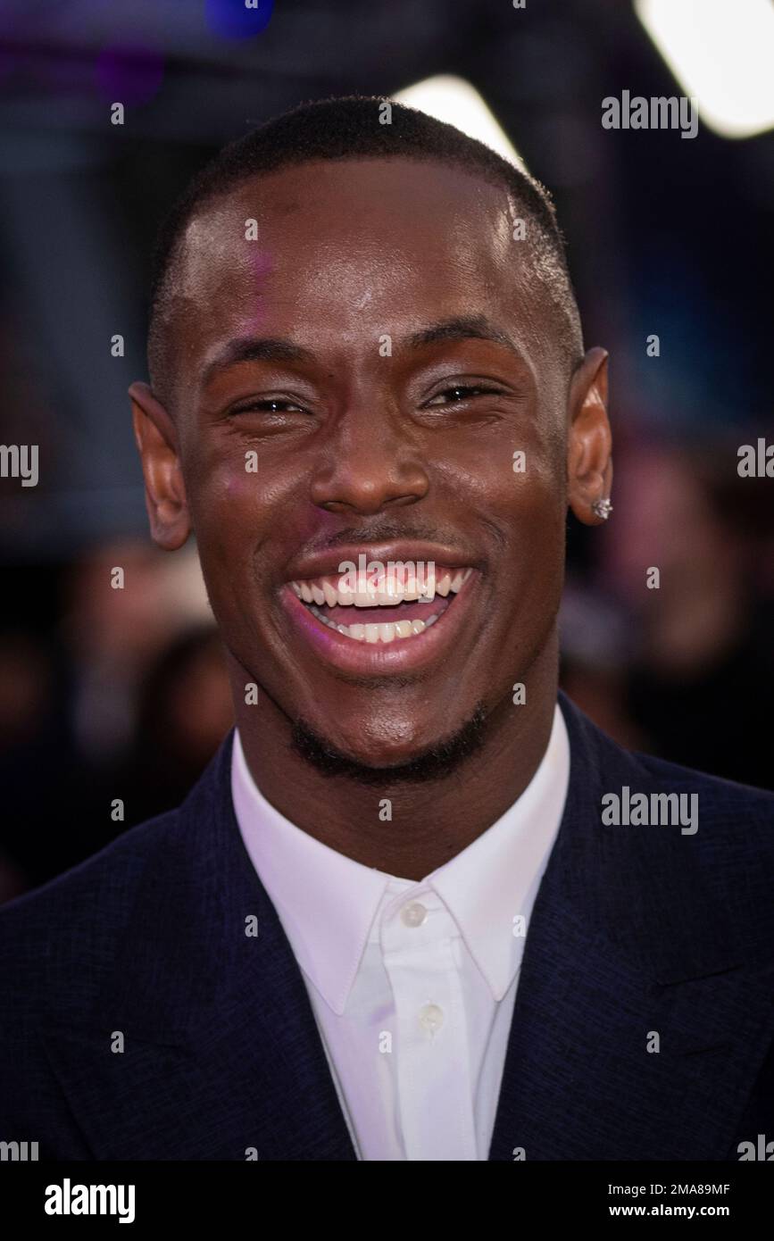 Micheal Ward poses for photographers upon arrival for the premiere of ...