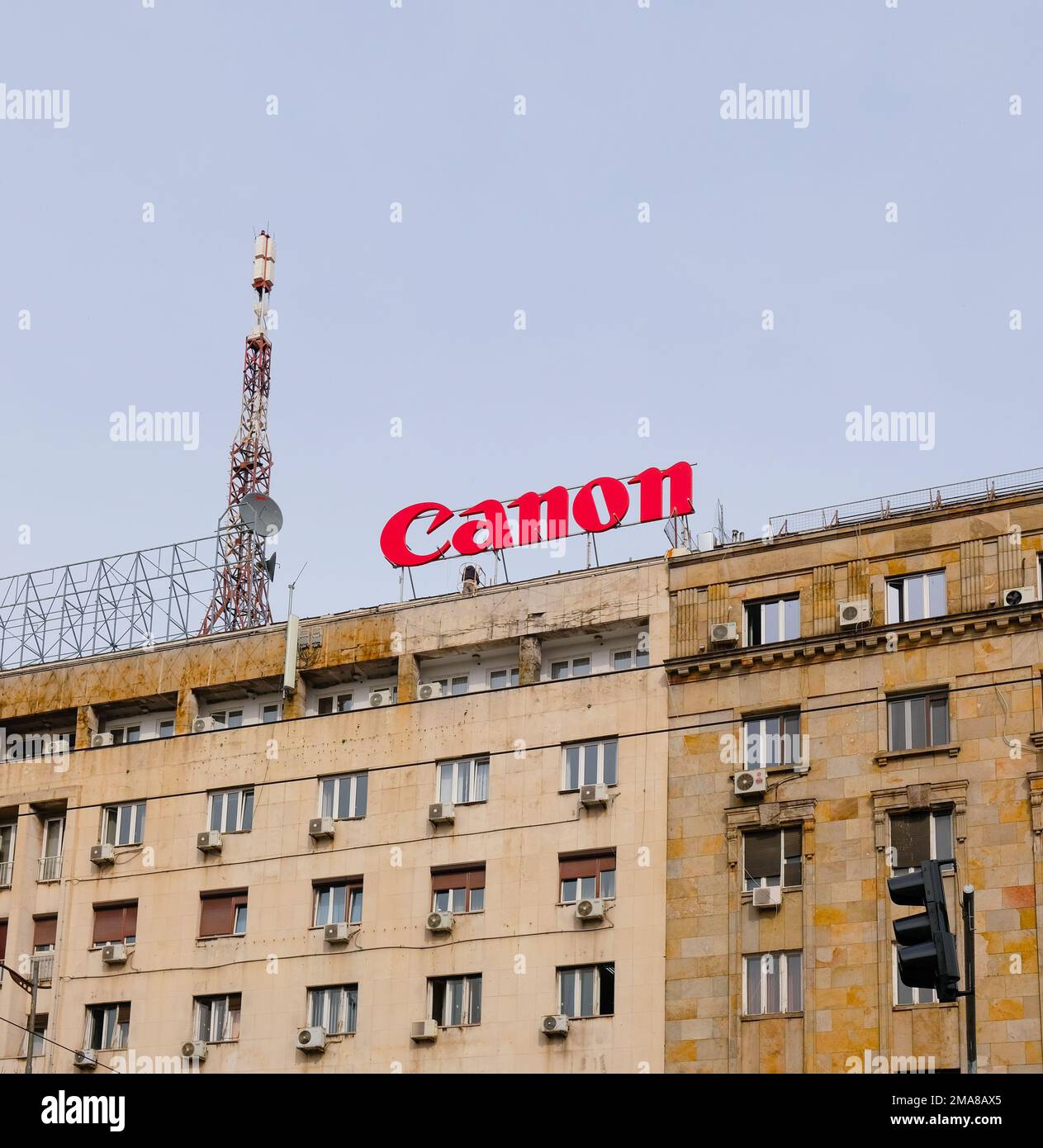 Canon advertising sign in red atop a building in Belgrade, Serbia Stock ...