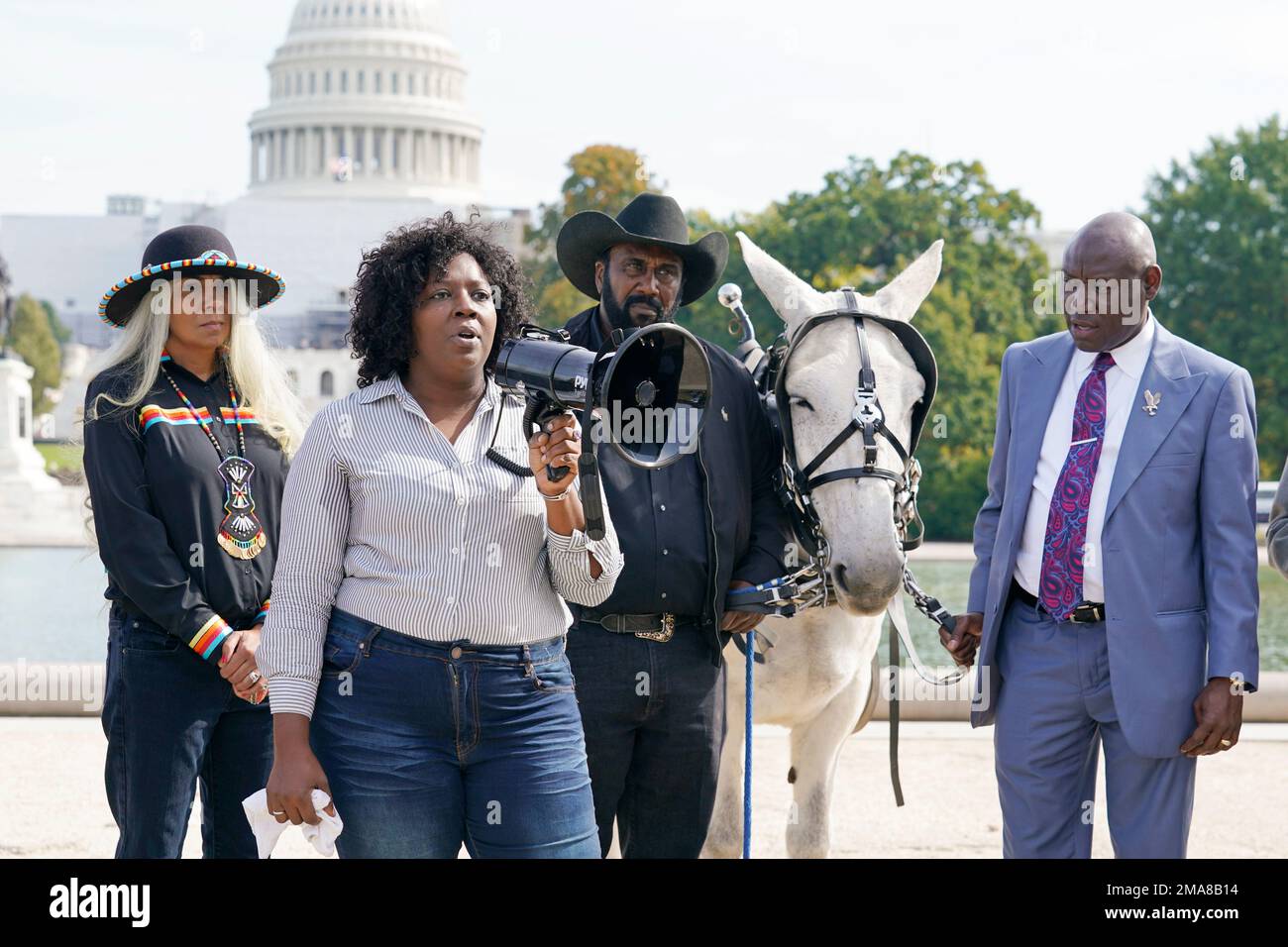 Princess Williams, second from left, speaks during a news conference ...