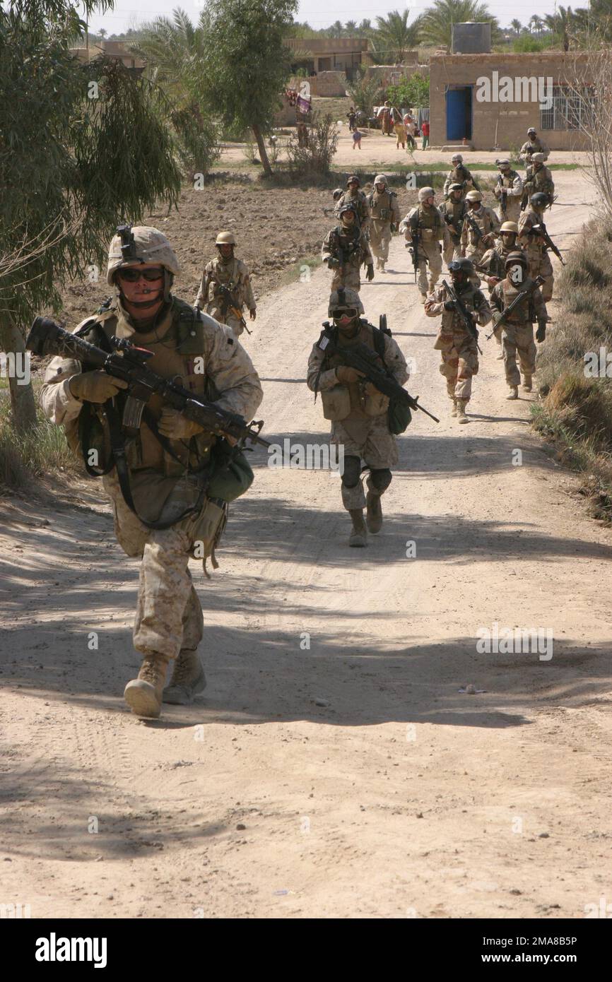 060317-M-0374B-020. [Complete] Scene Caption: On 17 March 2006, Marines ...