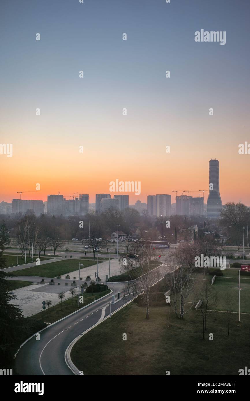 Belgrade city skyline at dawn with road leading into it. Belgrade tower ...