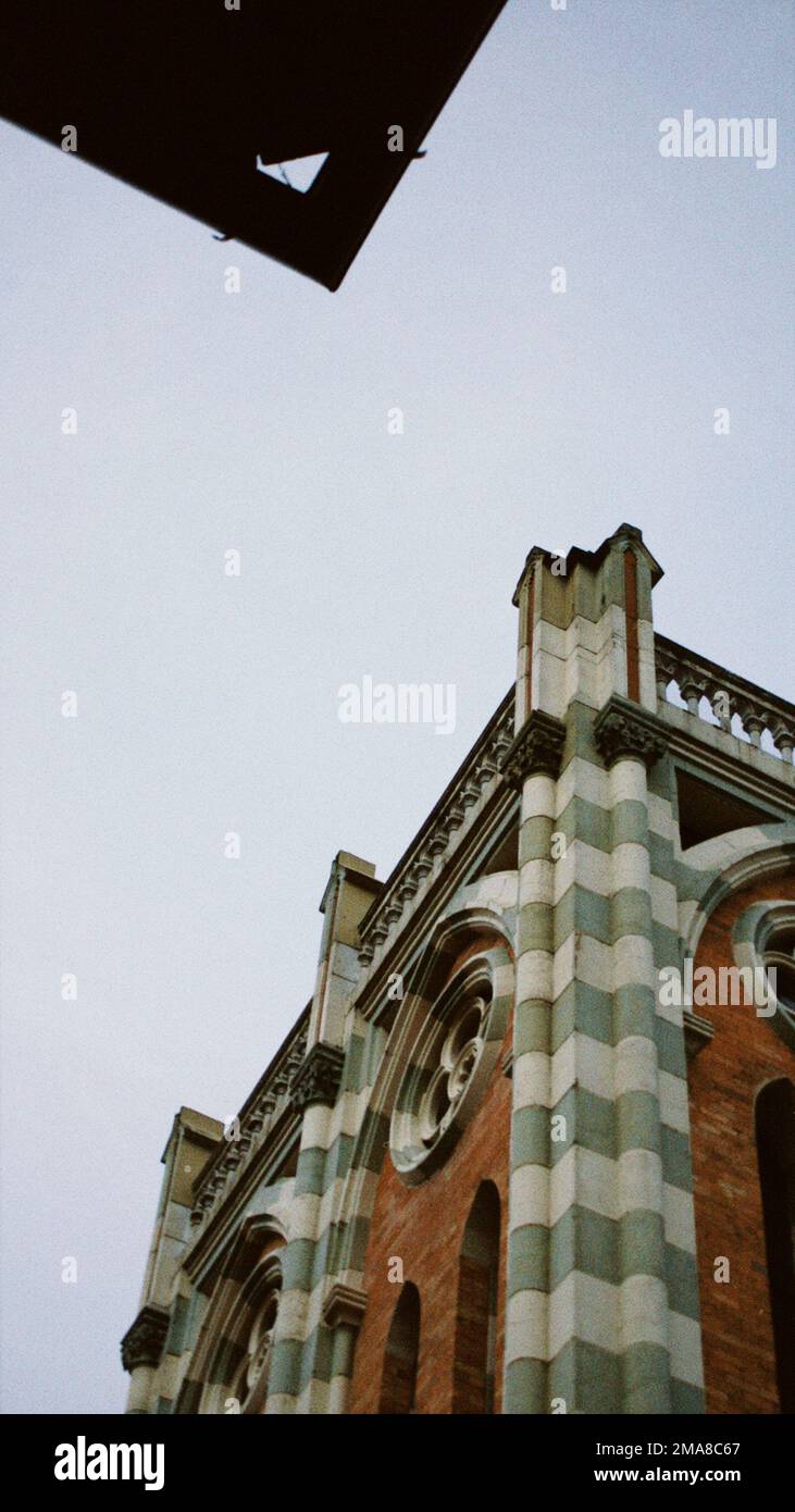 A vertical shot of a red brick building fragment. Bogota, Colombia ...