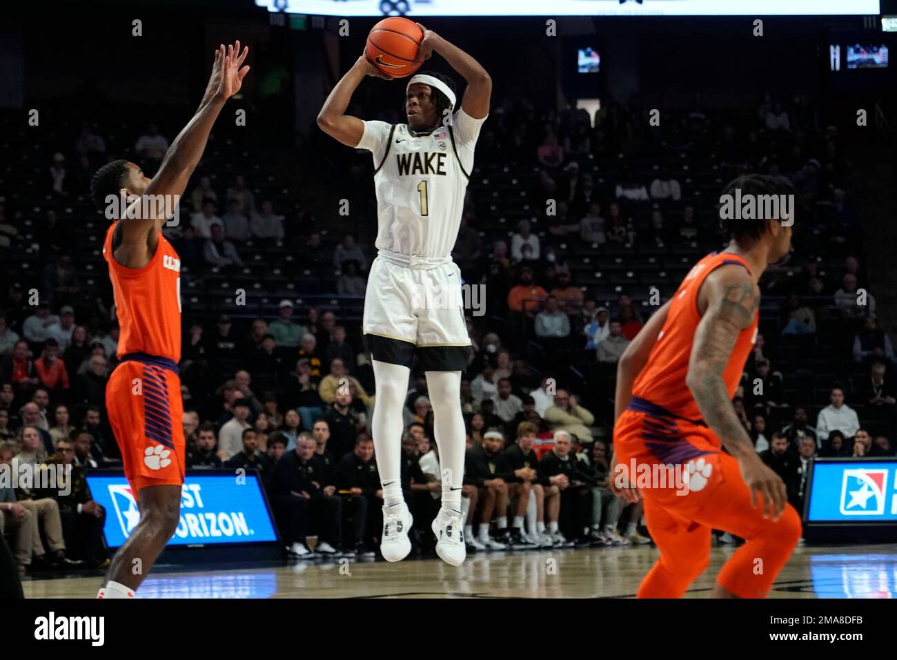 Wake Forest guard Tyree Appleby (1) shoots against Clemson guard Joshua ...