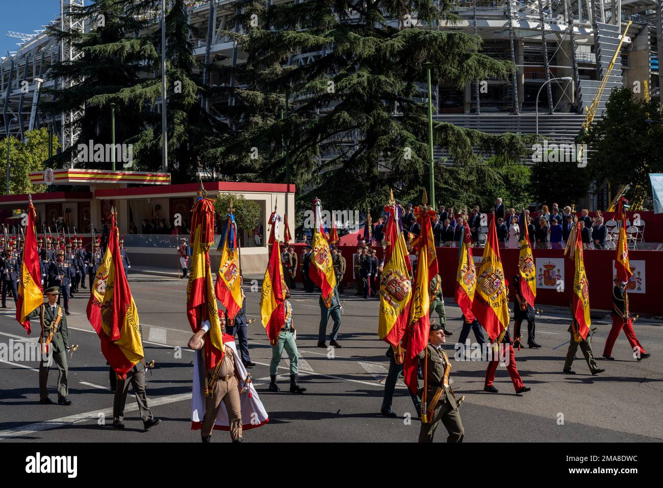 Spain armed forced unit members carry the Spanish national flag during ...