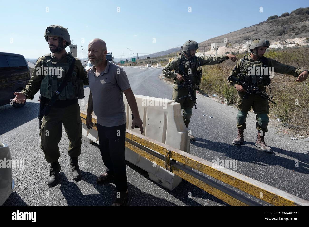 Israeli soldiers forces block the Hawara checkpoint, the main entrance ...
