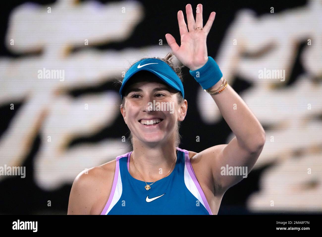 Belinda Bencic of Switzerland waves after defeating Claire Liu of the U ...