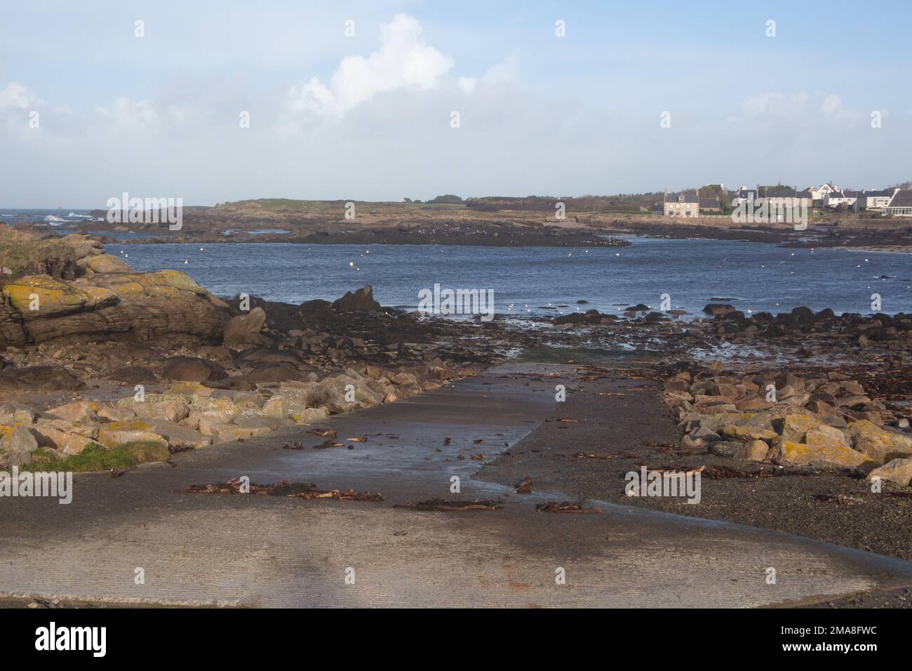Coast with a slipway at low tide in Porspoder Stock Photo - Alamy