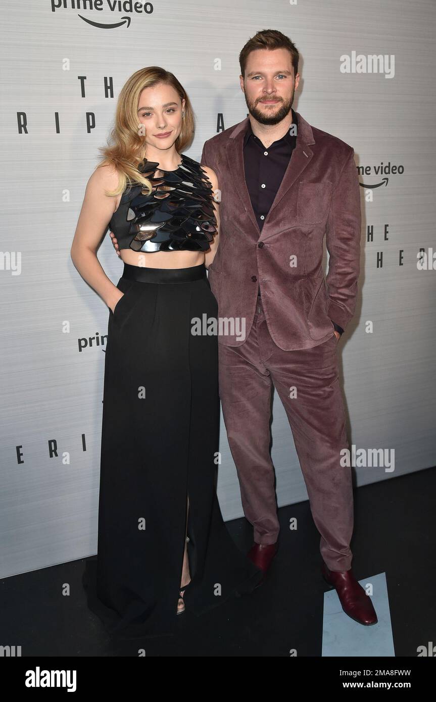 Chloe Grace Moretz, left, and Jack Reynor arrive at a red carpet event ...