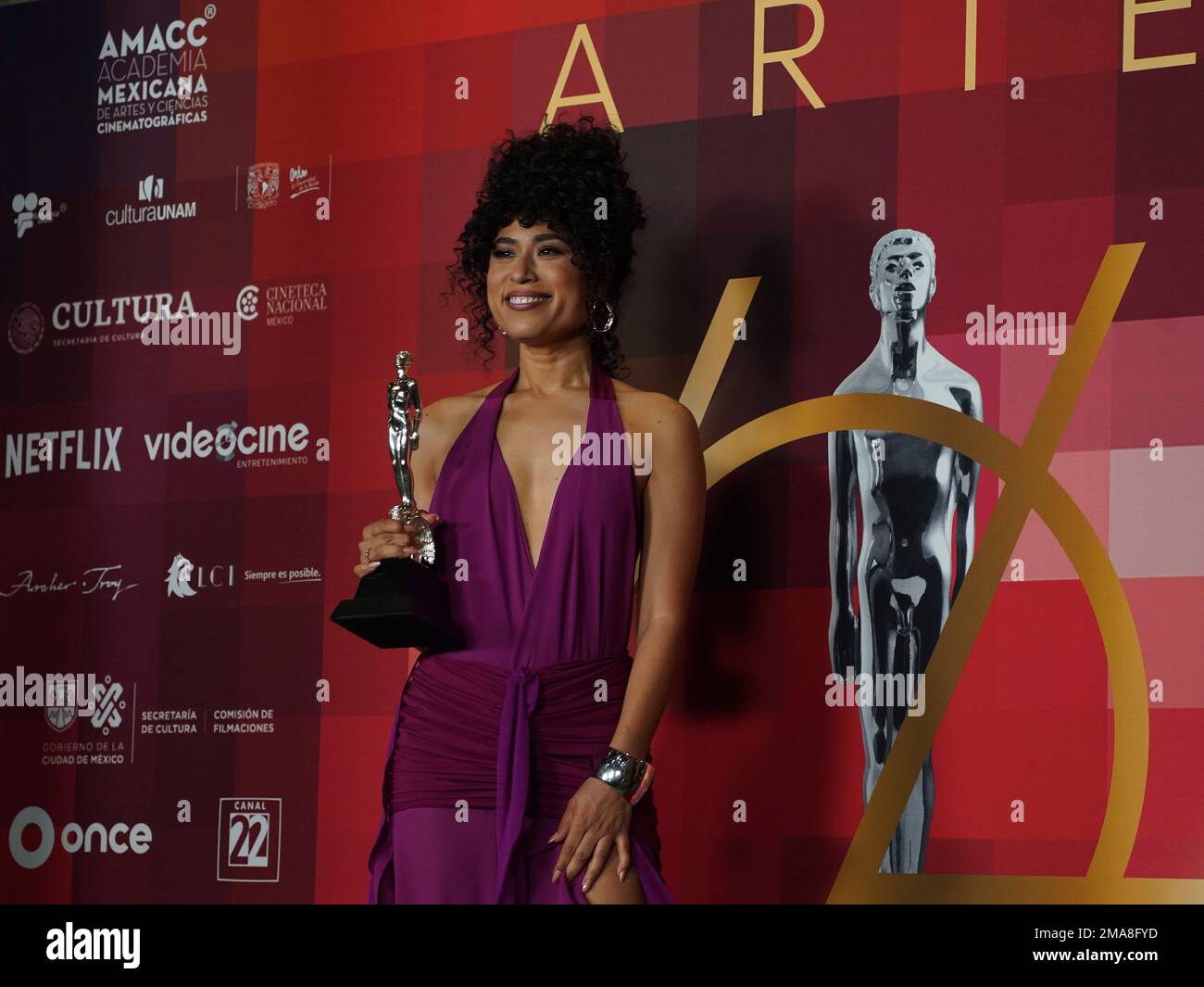 Mayra Batalla holds her prize as best female supporting actor for her ...