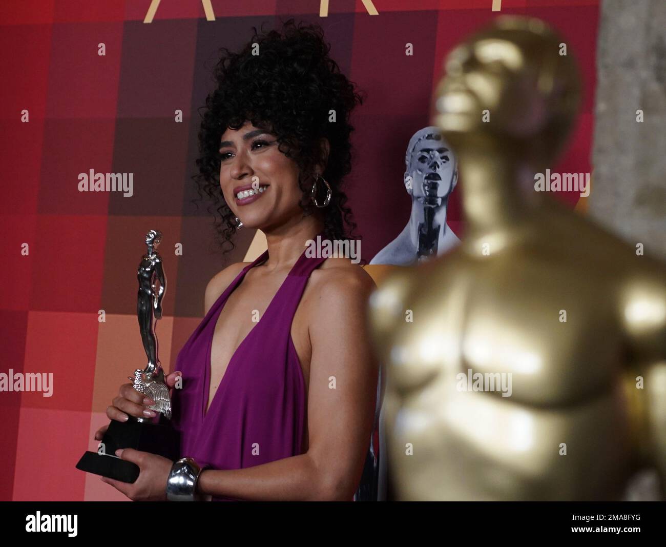Mayra Batalla holds her prize as best female supporting actor for her ...