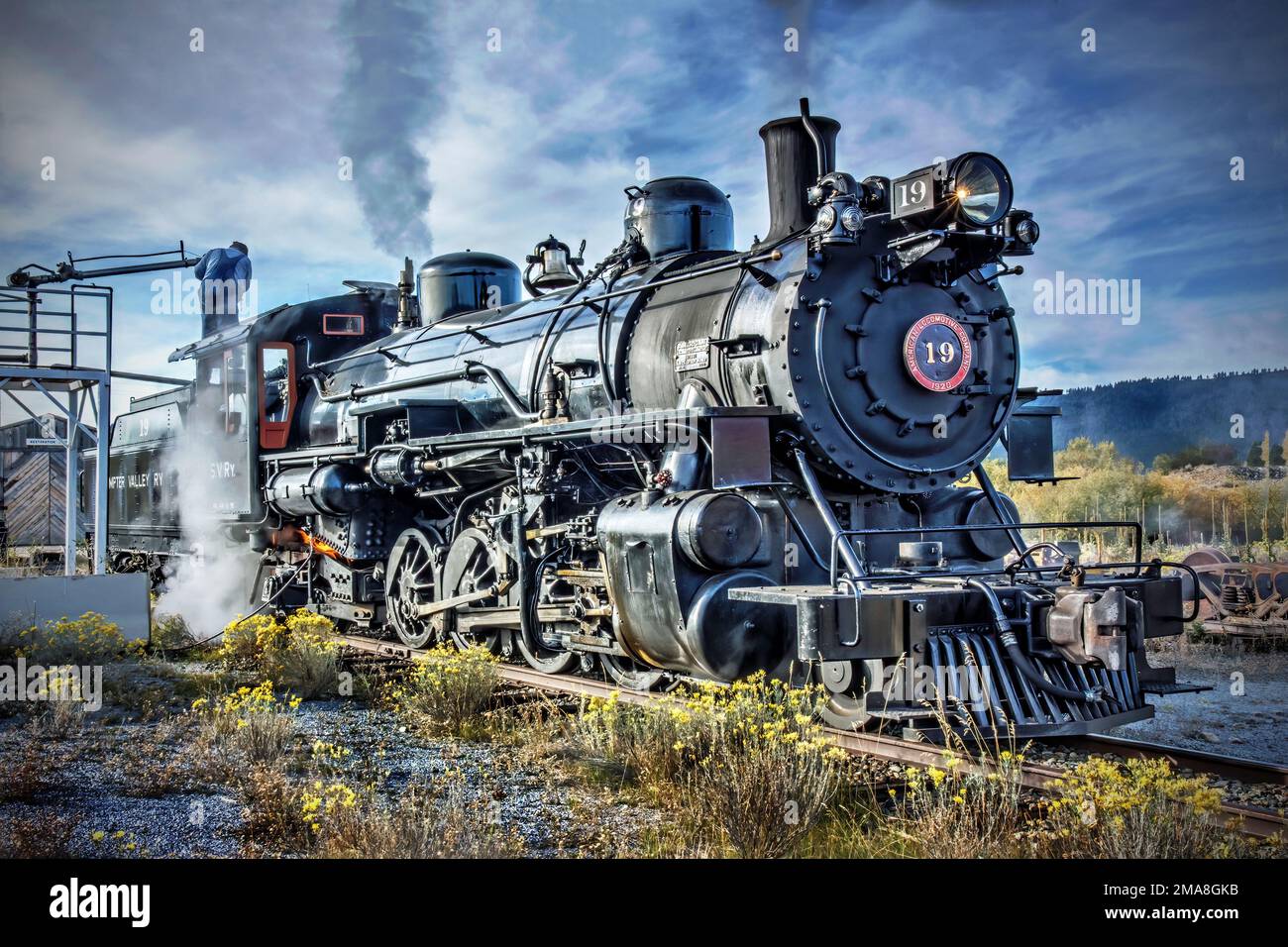 Steam Engine number 19 taking on water at maintenance station Stock ...
