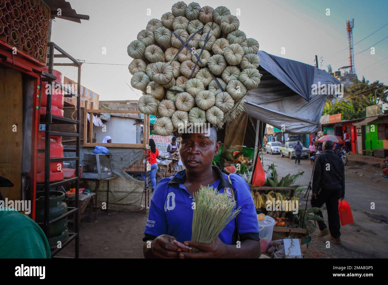 January 17, 2023, Nairobi, Kenya: A man selling brooms by the streets ...