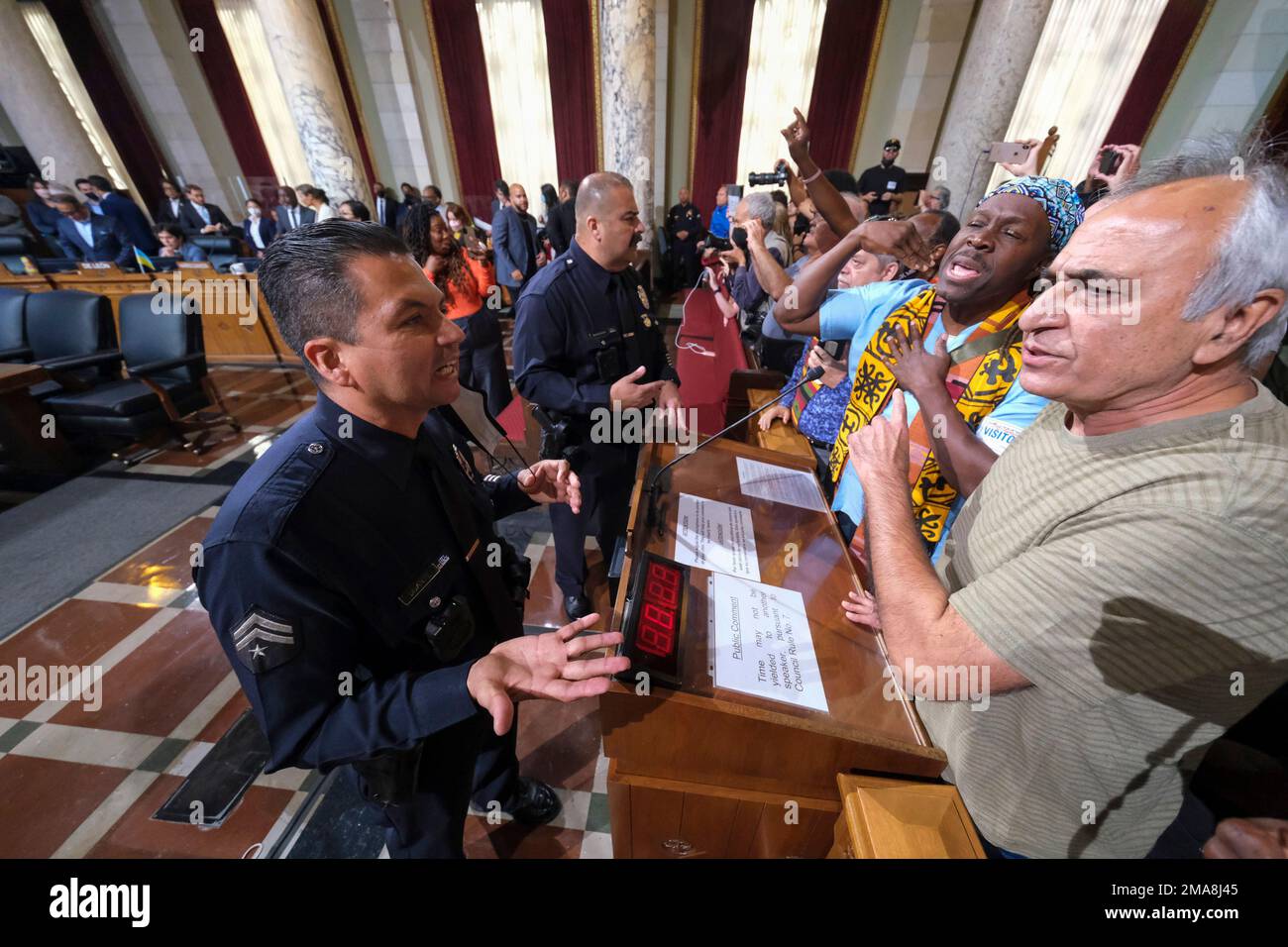 People Hold Signs And Shout Slogans Before The Starting The Los Angeles