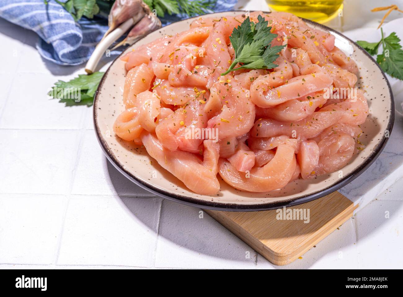 Cooking diet white poultry meat background. Fresh sliced chicken strips ...
