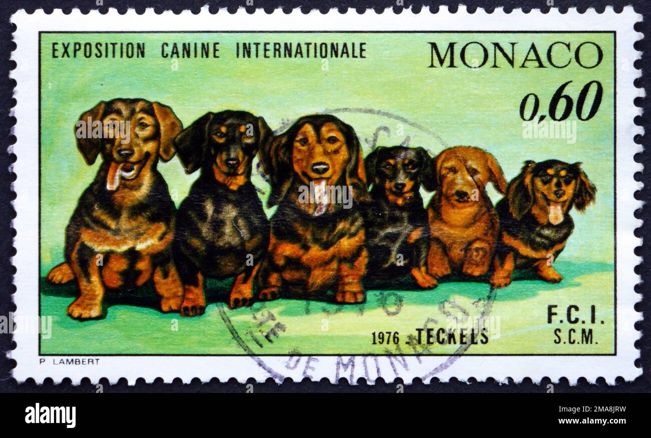 MONACO - CIRCA 1976 a stamp printed in Monaco shows Dachshunds ...