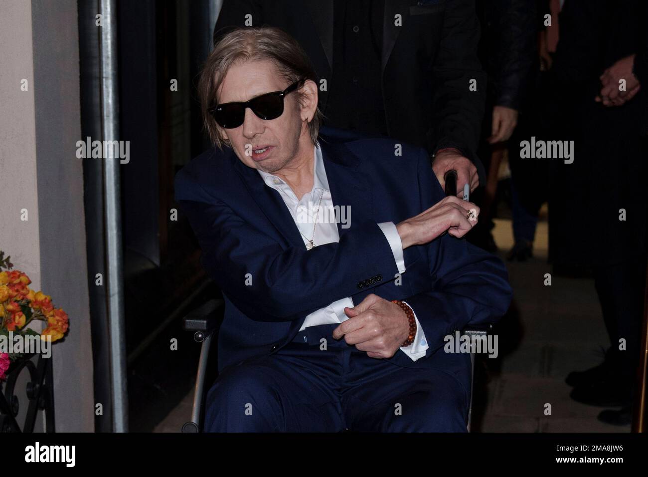 Shane MacGowan poses for photographers upon arrival at the Shane ...