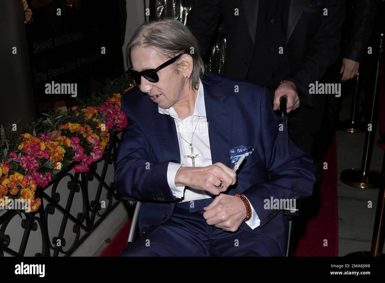 Shane MacGowan poses for photographers upon arrival at the Shane ...