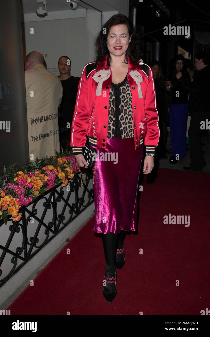 Jasmine Guinness poses for photographers upon arrival at the Shane ...
