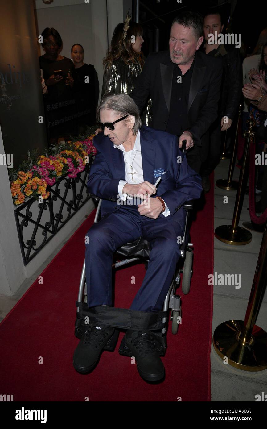 Shane MacGowan poses for photographers upon arrival at the Shane ...