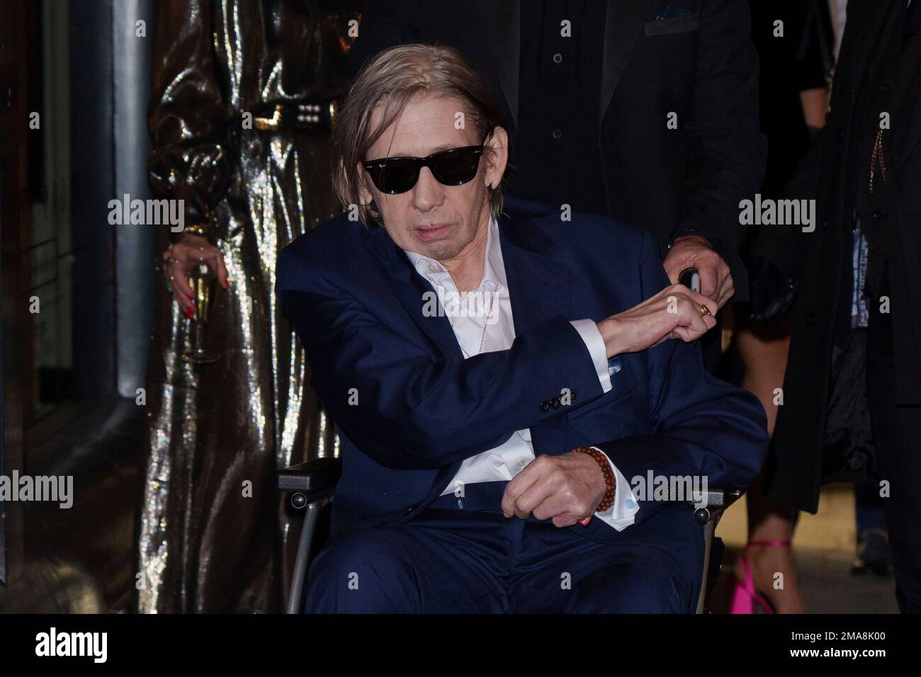 Shane MacGowan poses for photographers upon arrival at the Shane ...