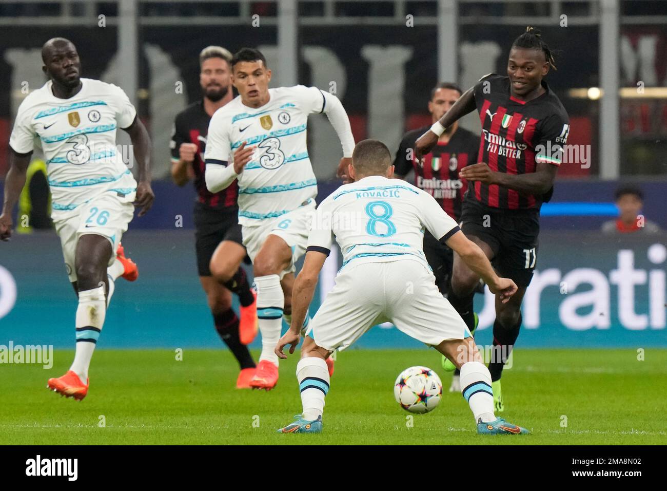 AC Milan's Rafael Leao, right, is challenged by Chelsea's Mateo Kovacic during a Group E soccer ...