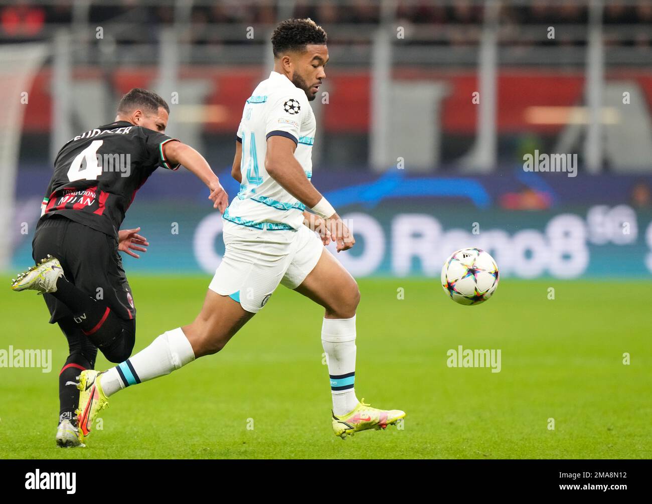 Chelsea's Reece James, right, is challenged by AC Milan's Ismael ...