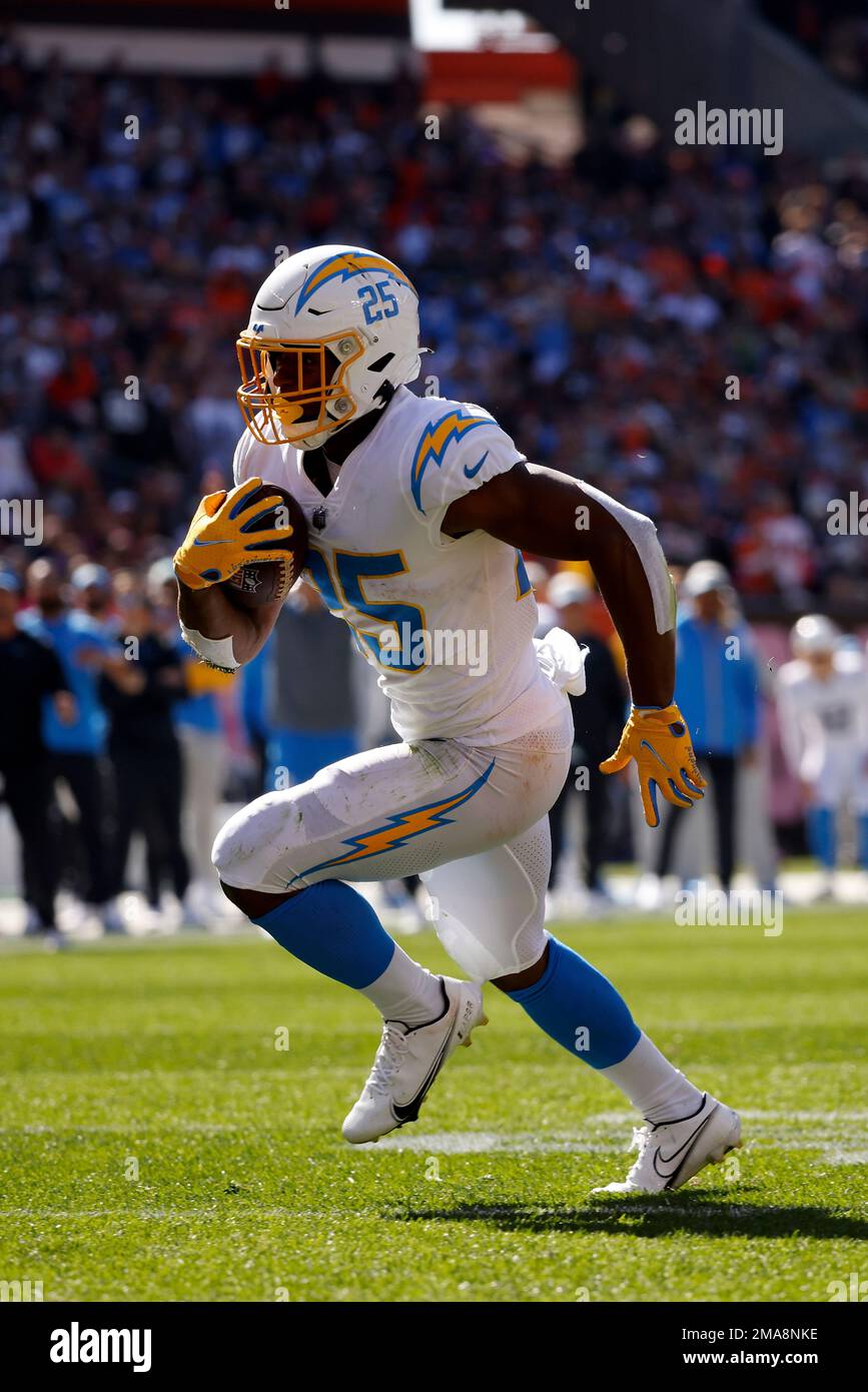 Los Angeles Chargers running back Joshua Kelley (25) runs with the ball ...