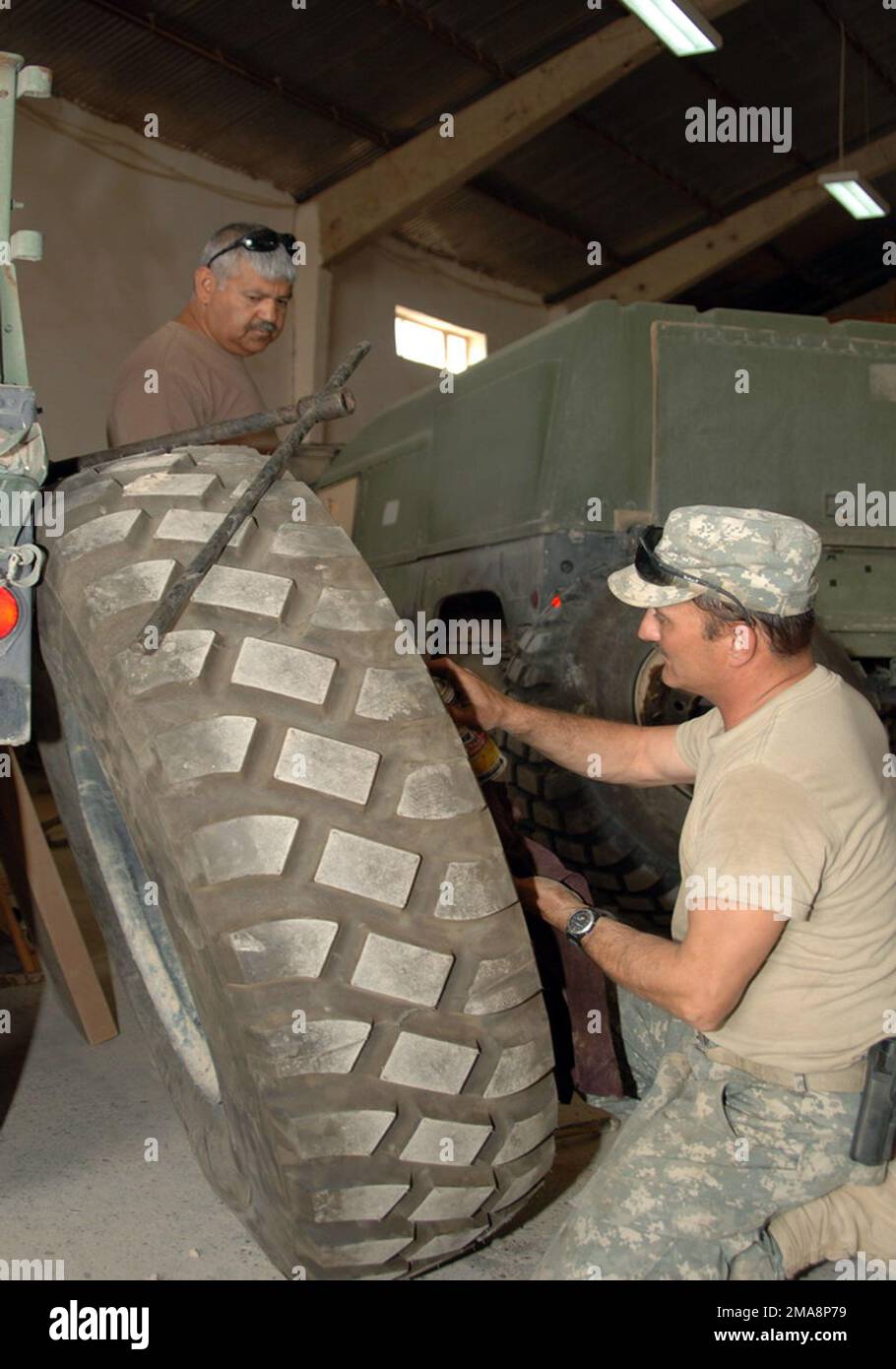 Repair a wheel from a 5 ton vehicle hi-res stock photography and images ...