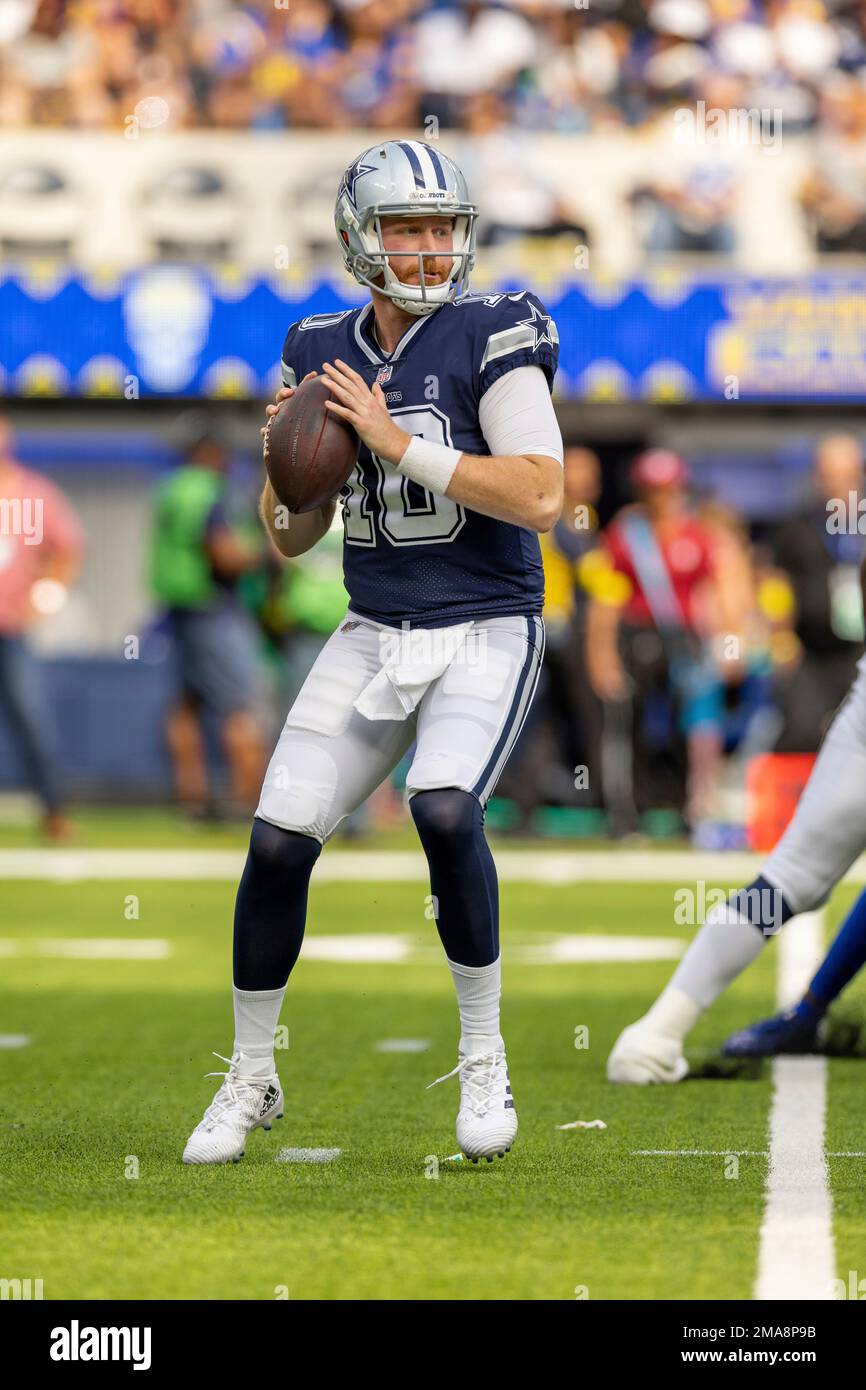 Quarterback (10) Cooper Rush of the Dallas Cowboys drops back to pass ...