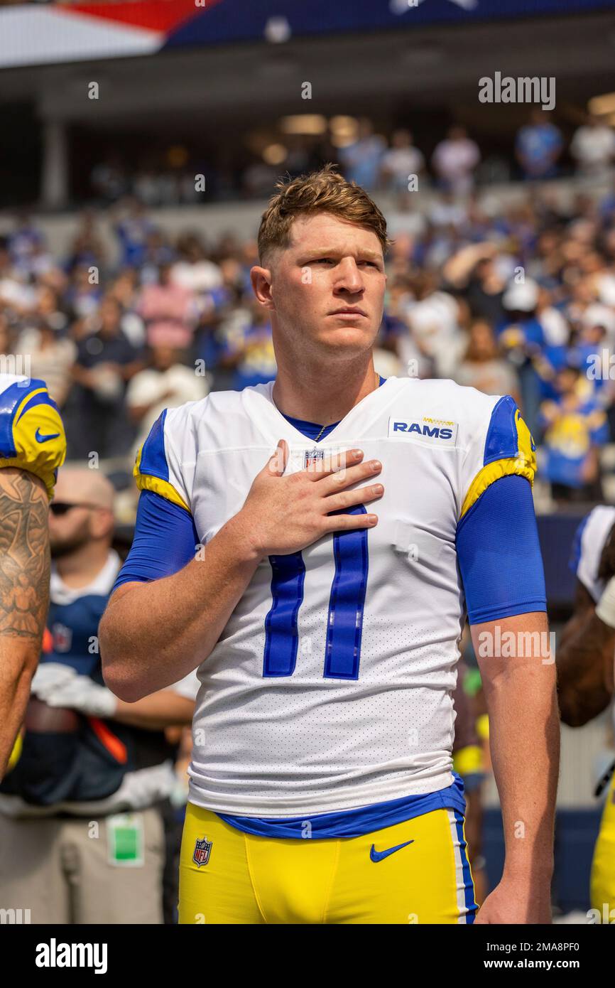 Punter (11) Riley Dixon of the Los Angeles Rams stands for the National ...