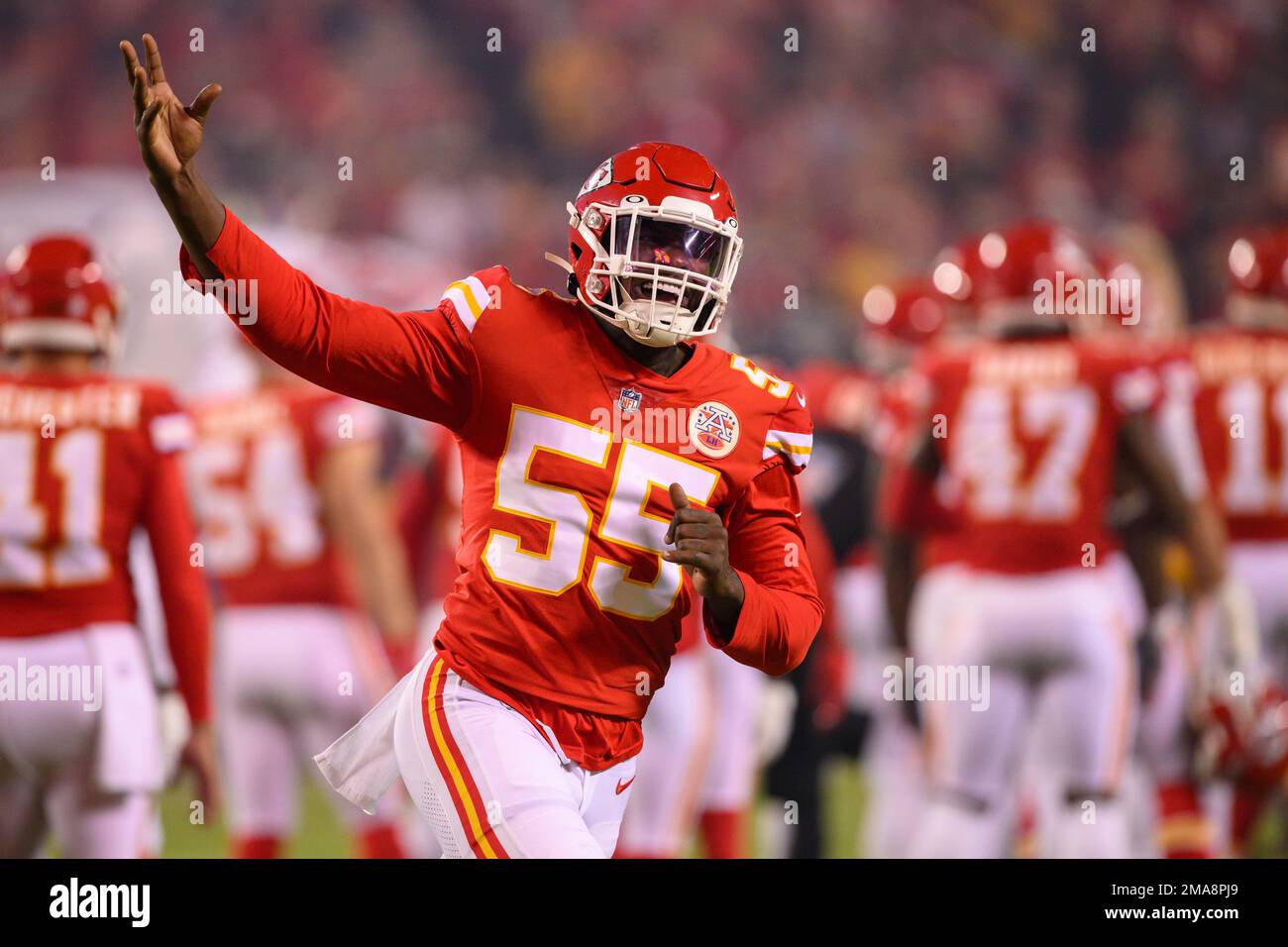 Kansas City Chiefs defensive end Frank Clark (55) comes onto the field ...