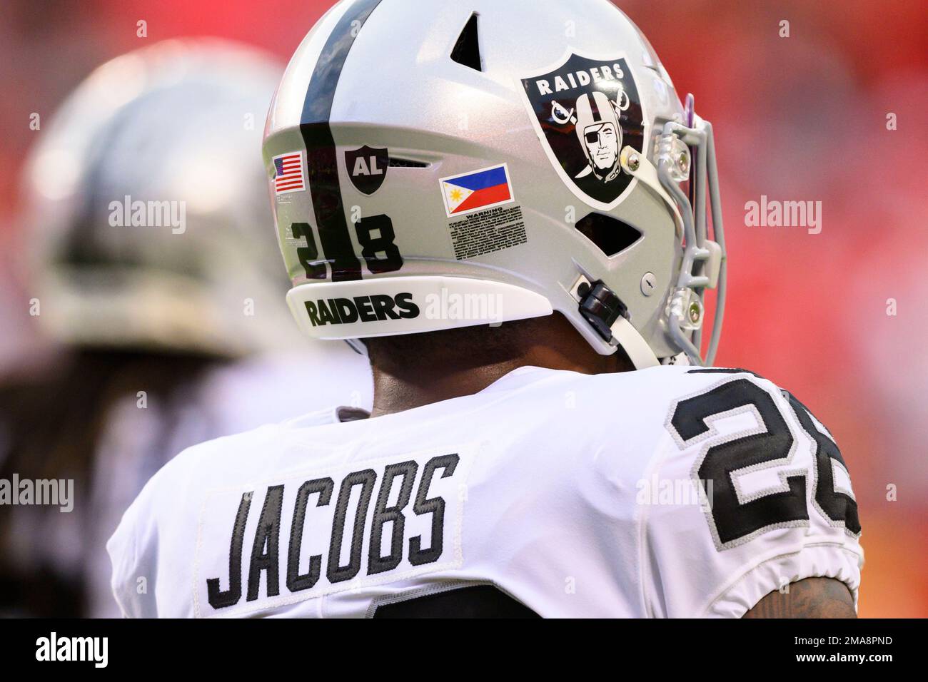 Las Vegas Raiders running back Josh Jacobs wears a helmet decal with the flag of the Philippines ...