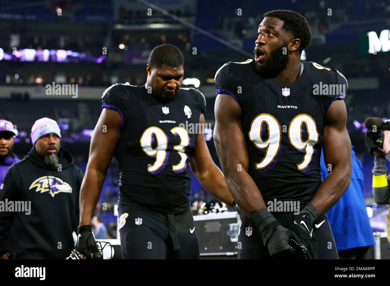 Baltimore Ravens linebacker Odafe Oweh (99) and defensive tackle Calais ...