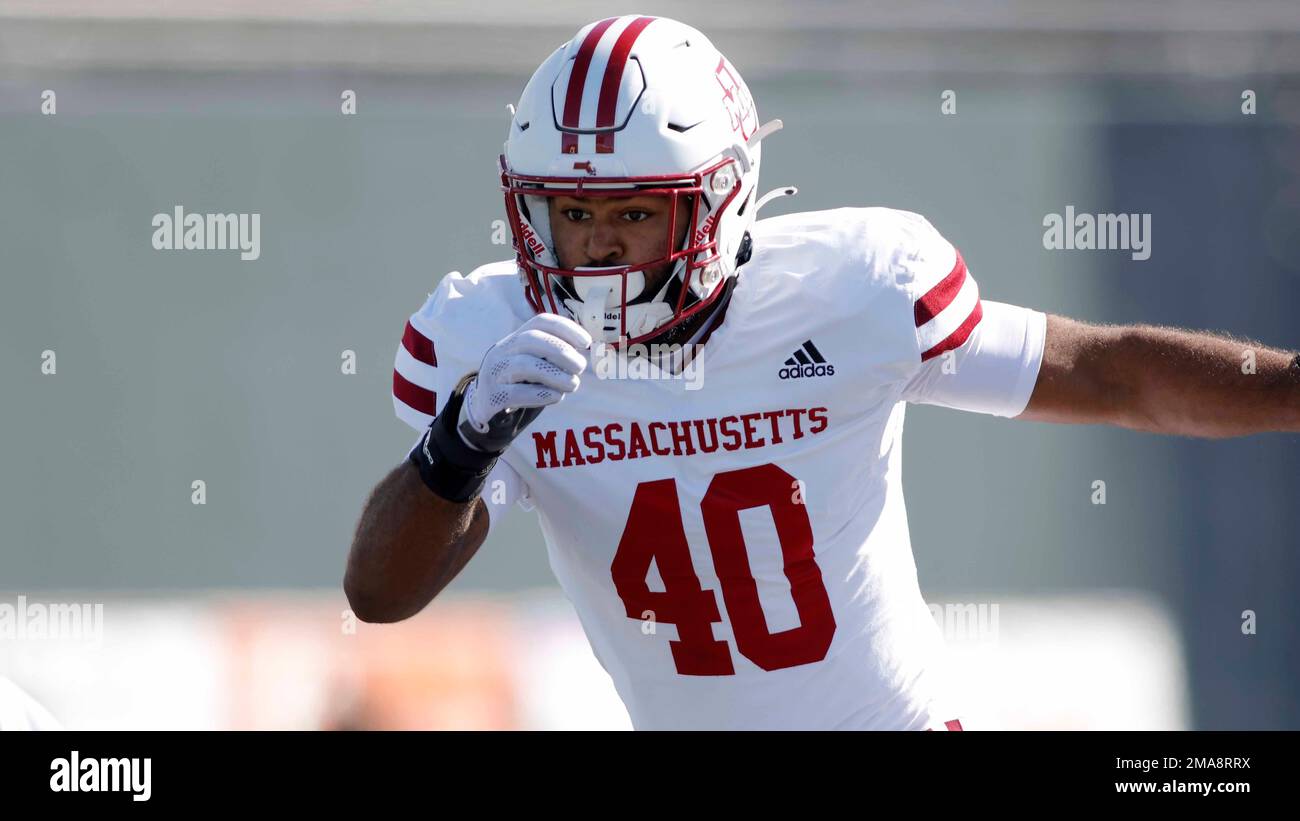 Massachusetts' Dominic Schofield plays during an NCAA football game on ...