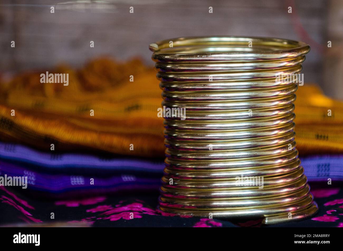 A soft focus of shiny brass coils for used as neck rings Stock Photo ...