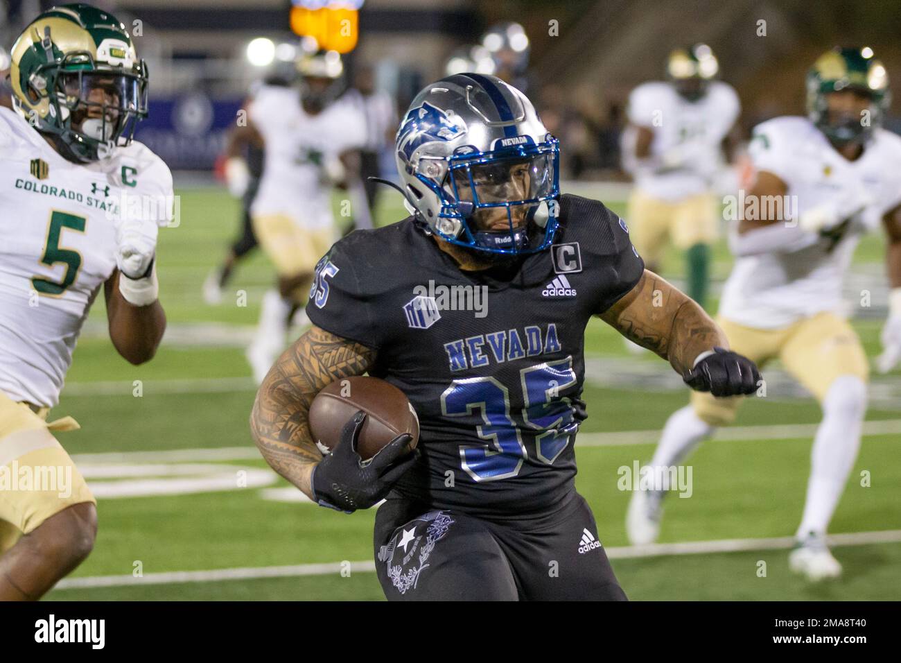 Nevada running back Toa Taua (35) runs against Colorado State in the ...