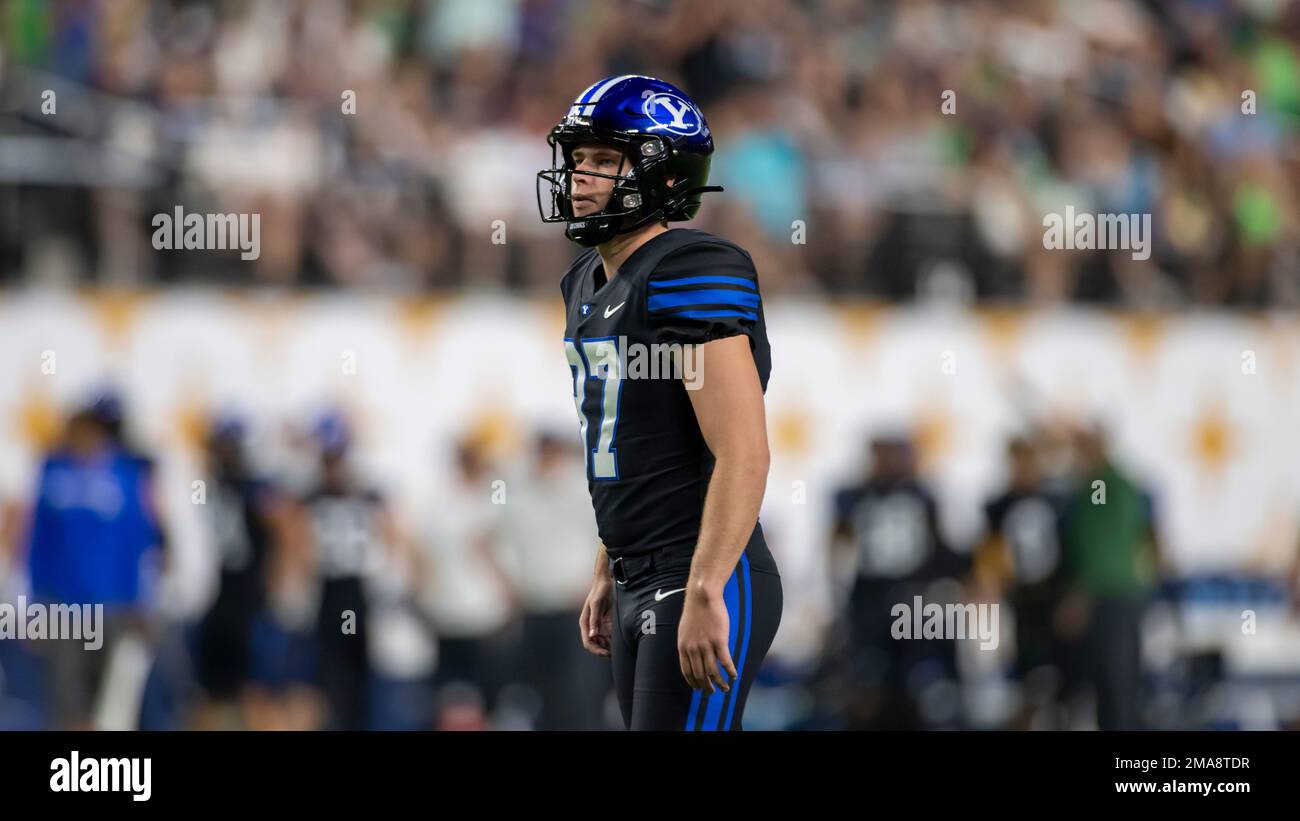 BYU Cougars place kicker Justen Smith (37) lines up to kick the ...