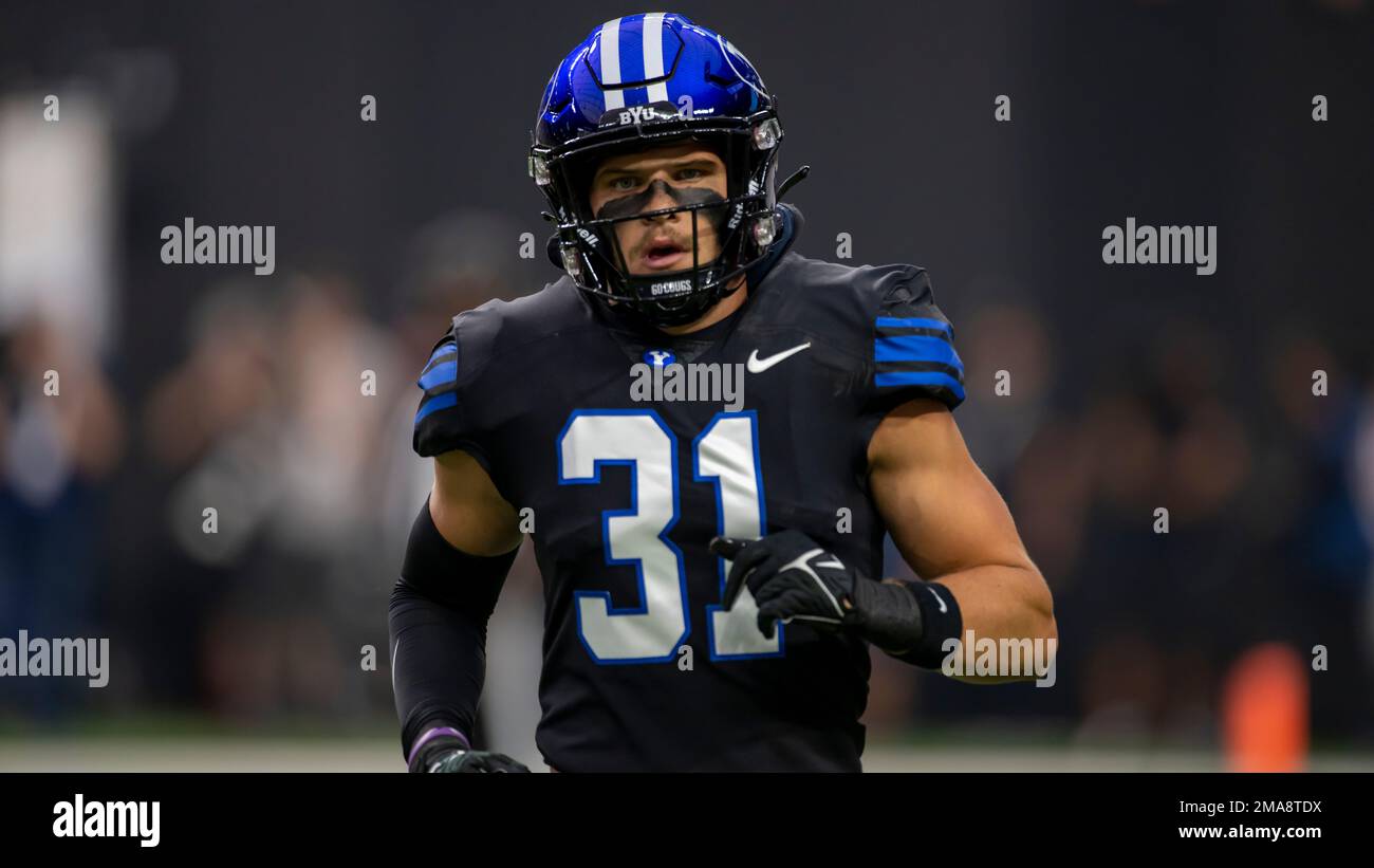 BYU Cougars linebacker Max Tooley (31) runs on defense during an NCAA ...