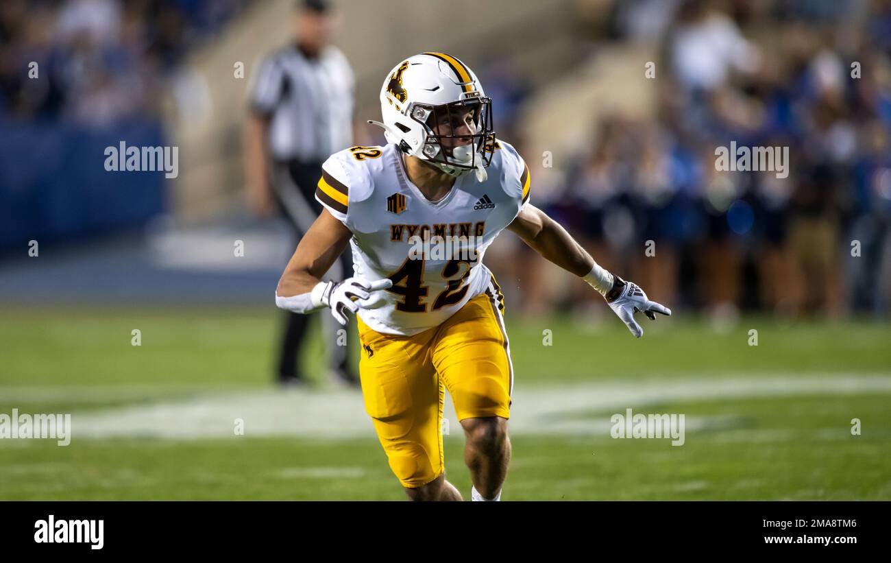 Wyoming Cowboys safety Isaac White (42) runs towards the football on ...