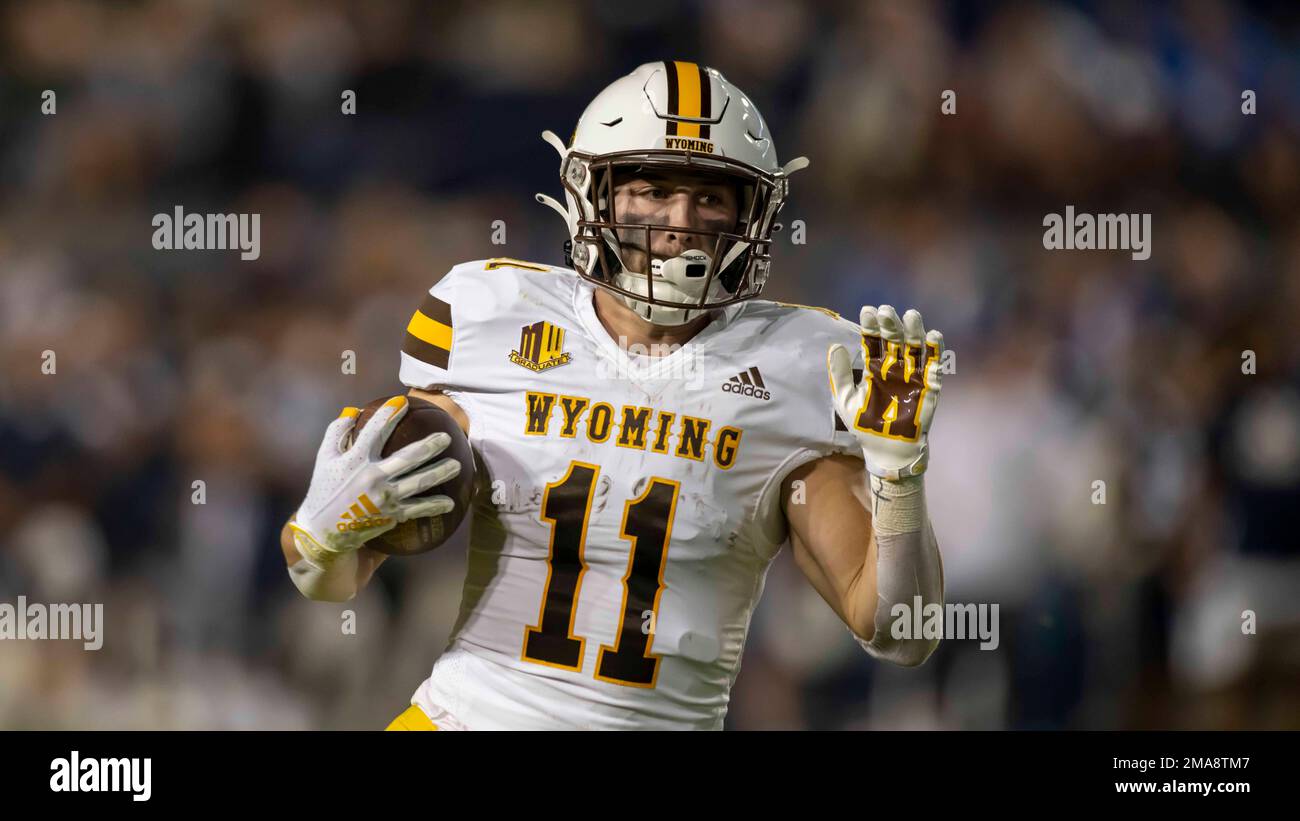 Wyoming Cowboys wide receiver Wyatt Wieland (11) runs the football ...