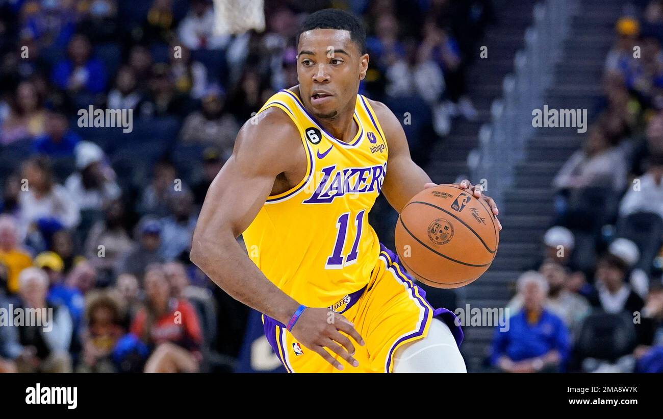Los Angeles Lakers guard Shaquille Harrison dribbles up the court ...