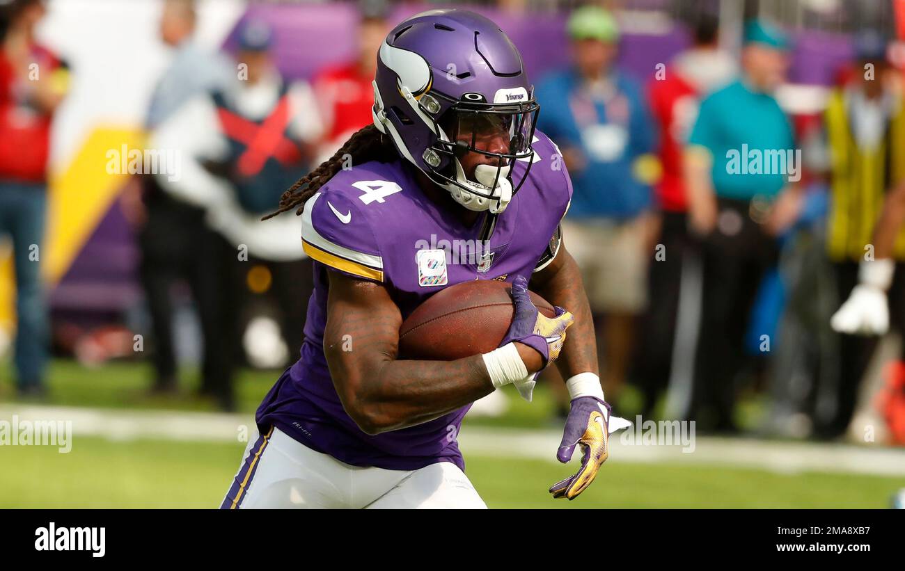 Minnesota Vikings running back Dalvin Cook (4) carries the ball up ...